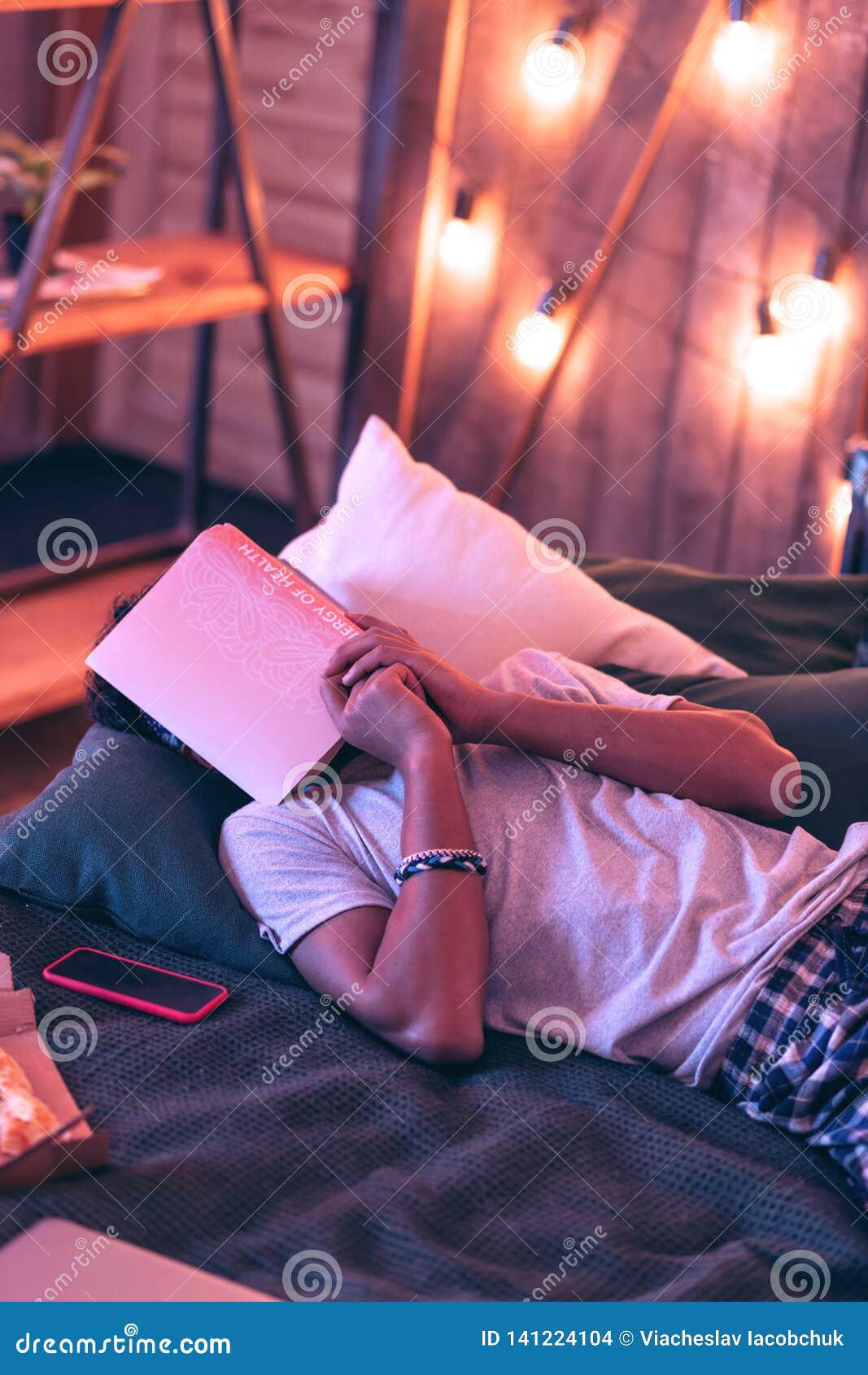 Active Boy Falling Asleep while Reading a Book because of Fatigue ...