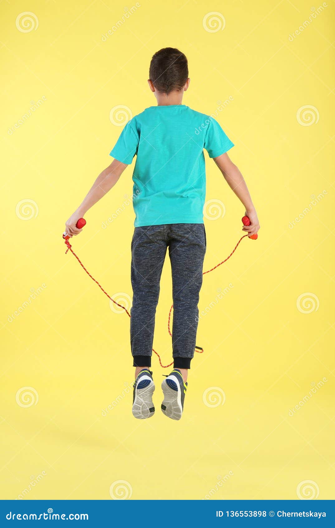 Active boy jumping rope stock photo. Image of fitness - 136553898