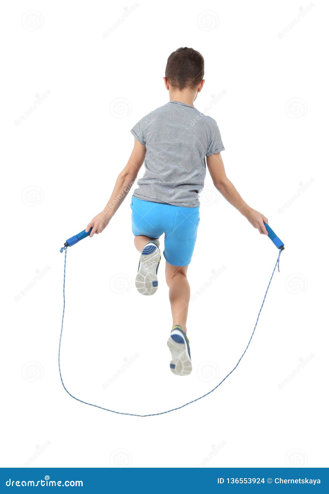Active boy jumping rope stock photo. Image of childhood - 136553924