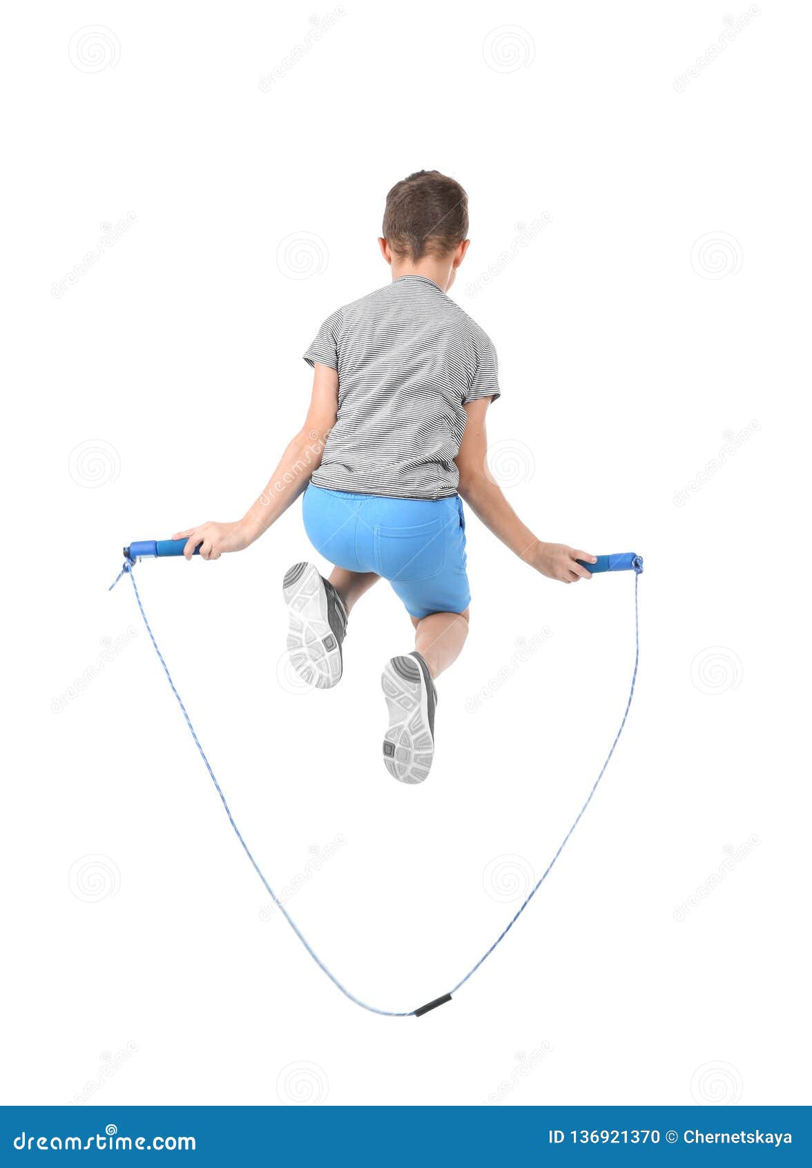 Active boy jumping rope stock photo. Image of jumping - 136921370