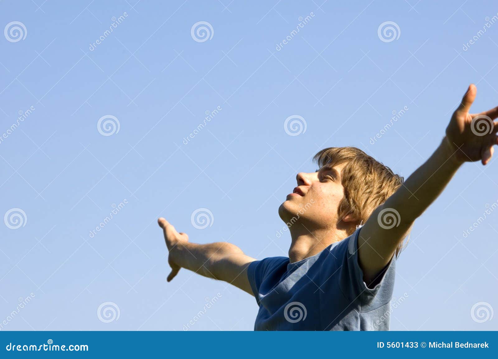 Active Boy Showing Happiness Stock Image - Image of hands, clouds: 5601433