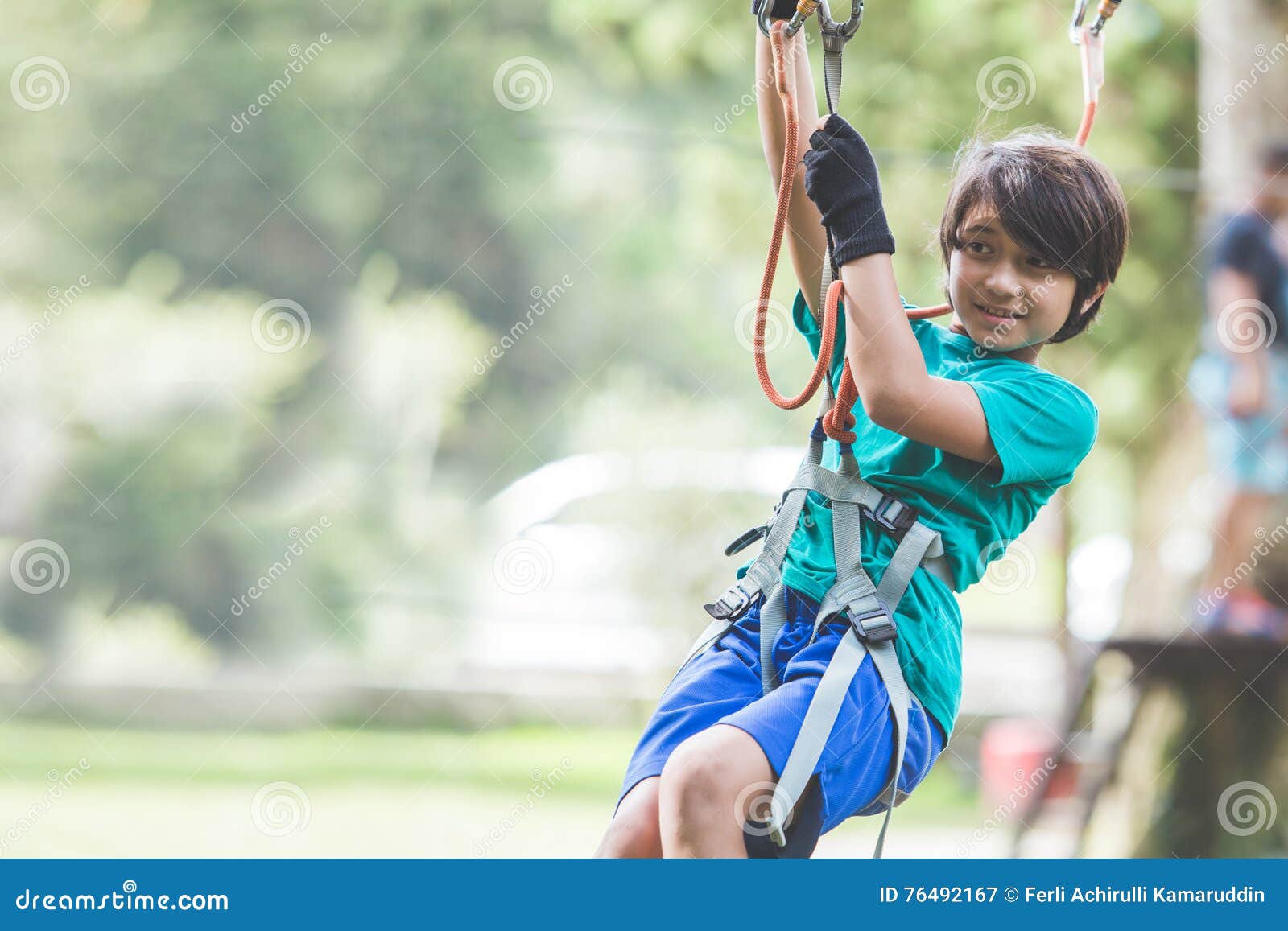 Active Brave Boy Enjoying Outbound Climbing at Adventure Park on Stock ...