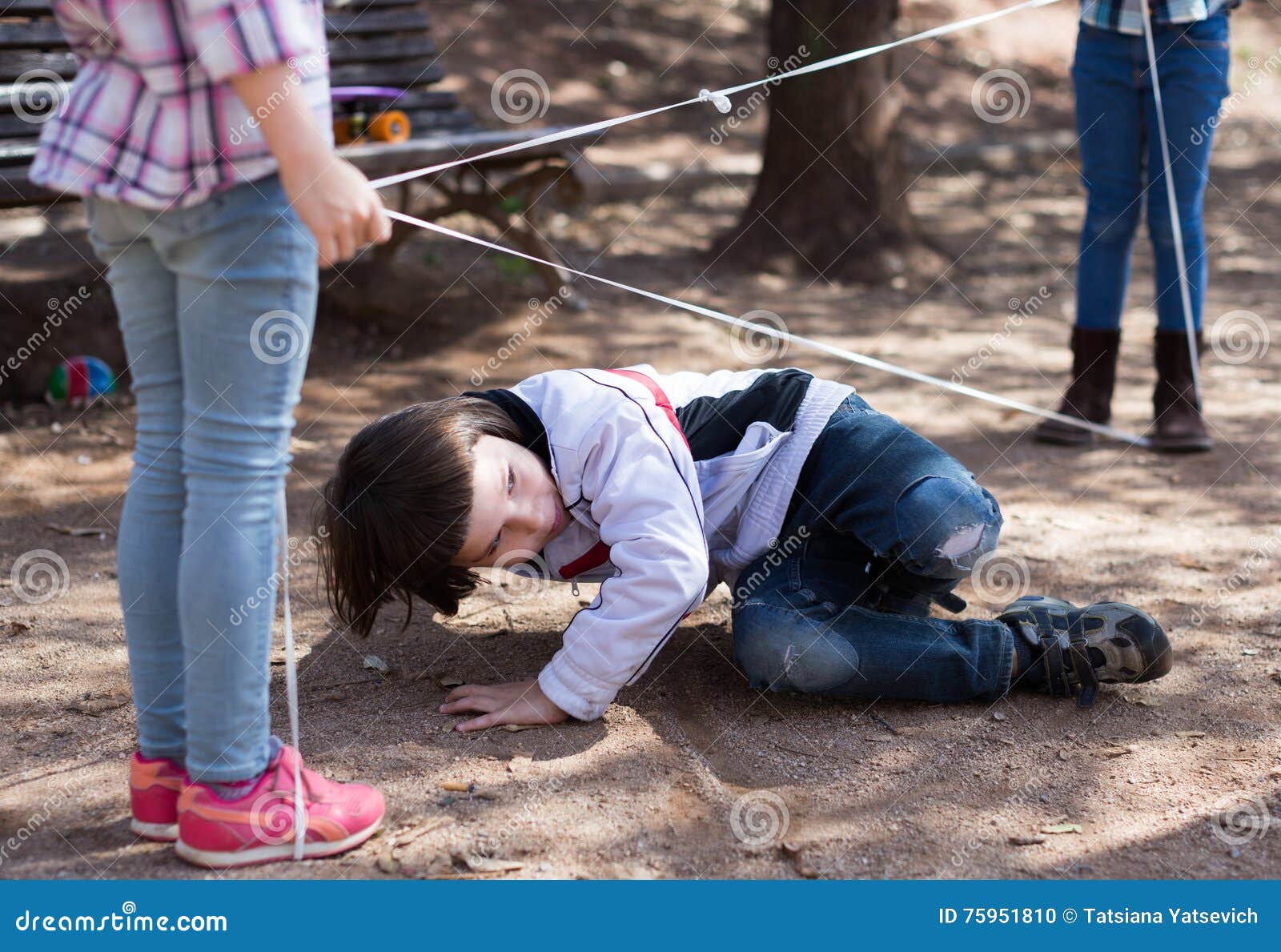 Active Children Games. Boy Gently Passes through the Tangled Rop Stock ...