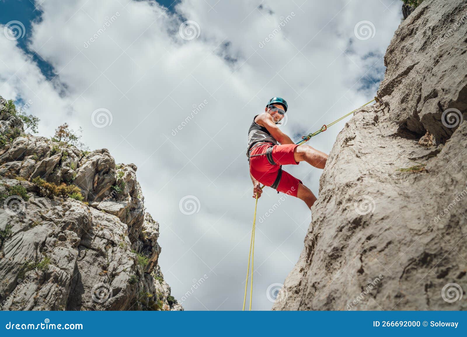 Active Climber Middle Age Man in Protective Helmet Looking at Camera ...