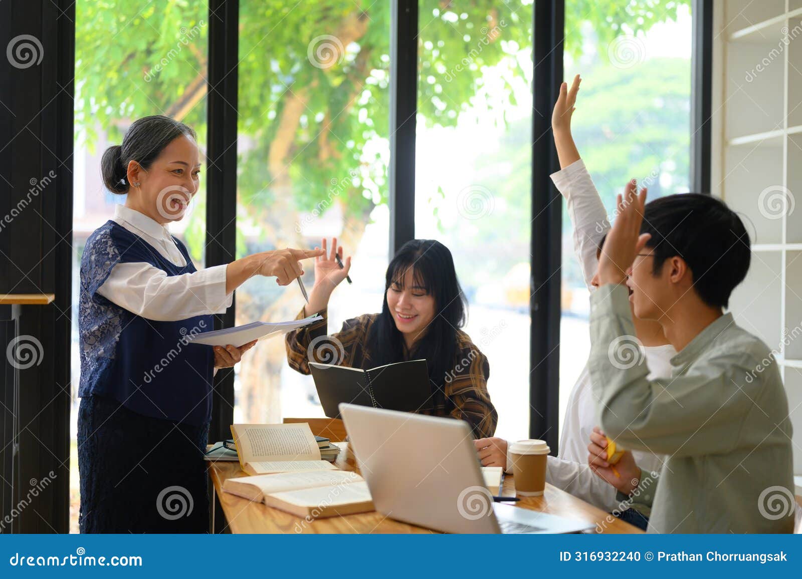 Active College Students Raising Hands To Answer Teacher& X27;s Question ...