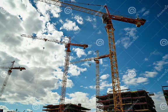Active Construction Site with Workers, Machines, and Scaffolding ...