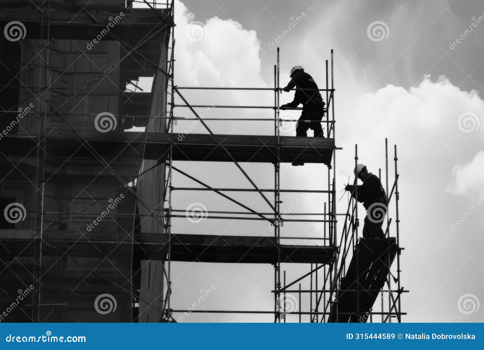 Active Construction Site with Workers, Machines, and Scaffolding ...