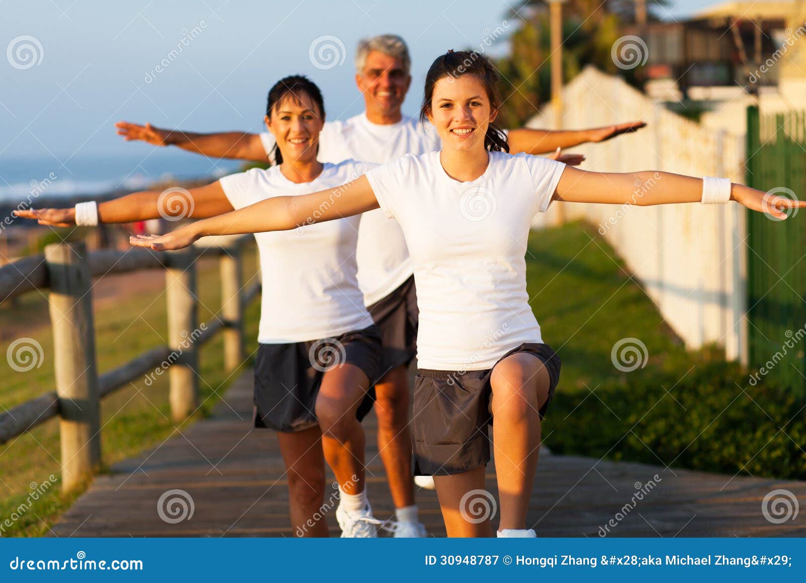 Active family exercising stock image. Image of adult - 30948787
