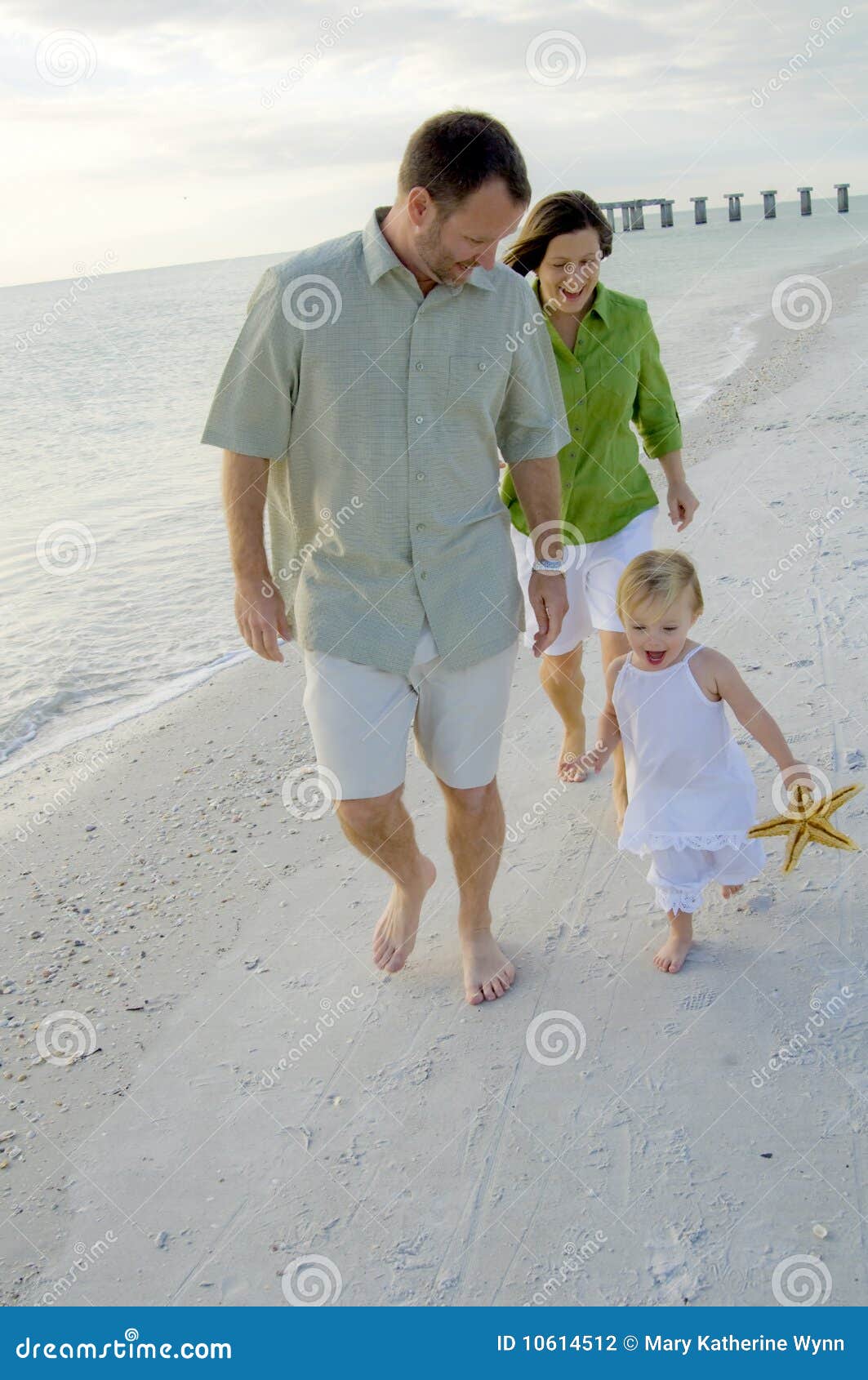 Active Family Playing on Beach Stock Photo - Image of parents, cute ...