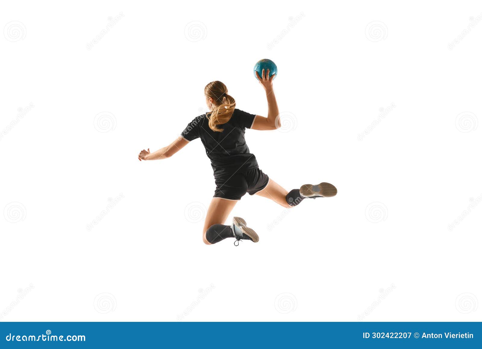 Active Female Handball Player Demonstrating Throwing Techniques ...