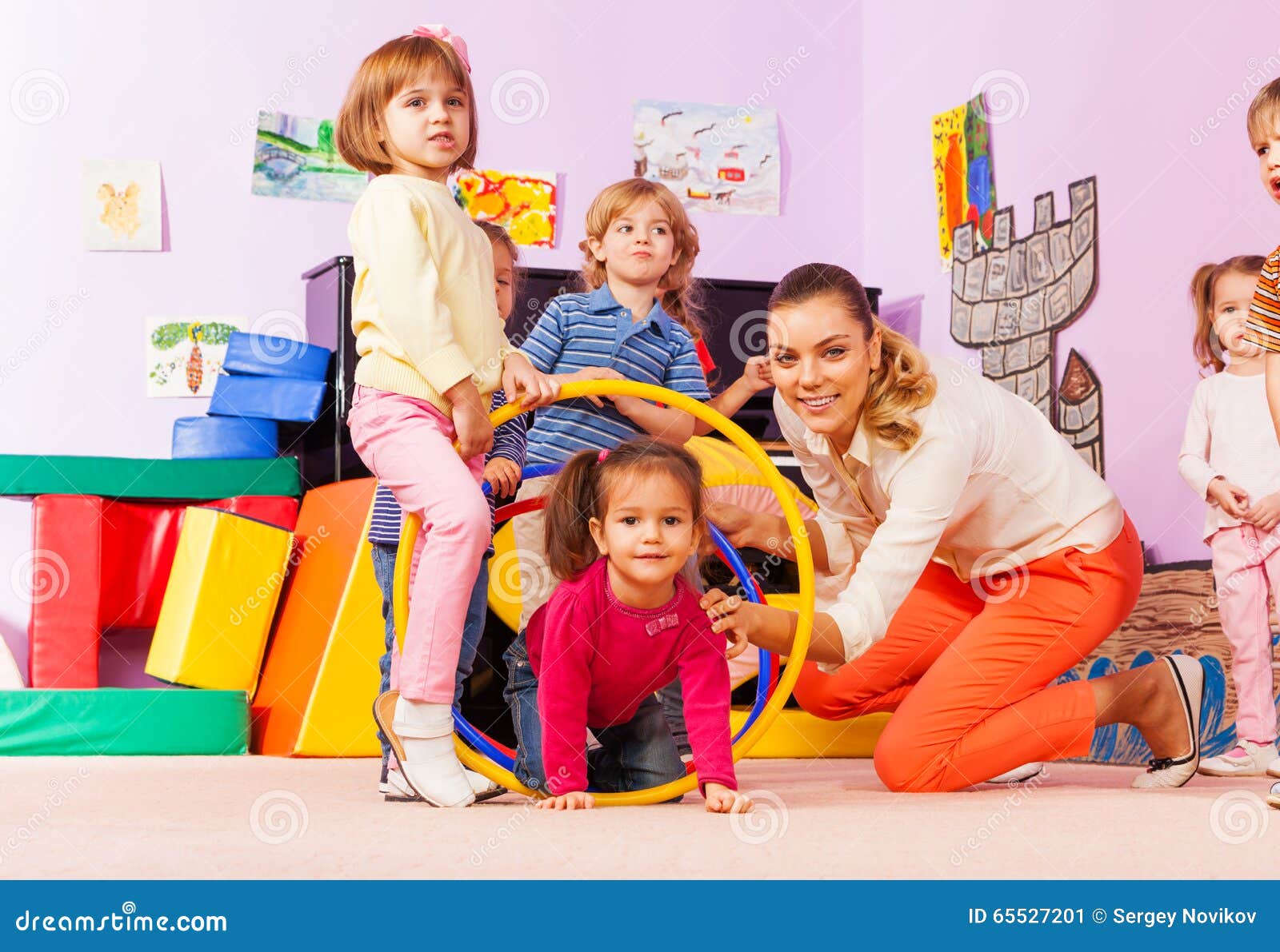 Active Game in Kindergarten Kids Go Though Hoops Stock Image - Image of ...