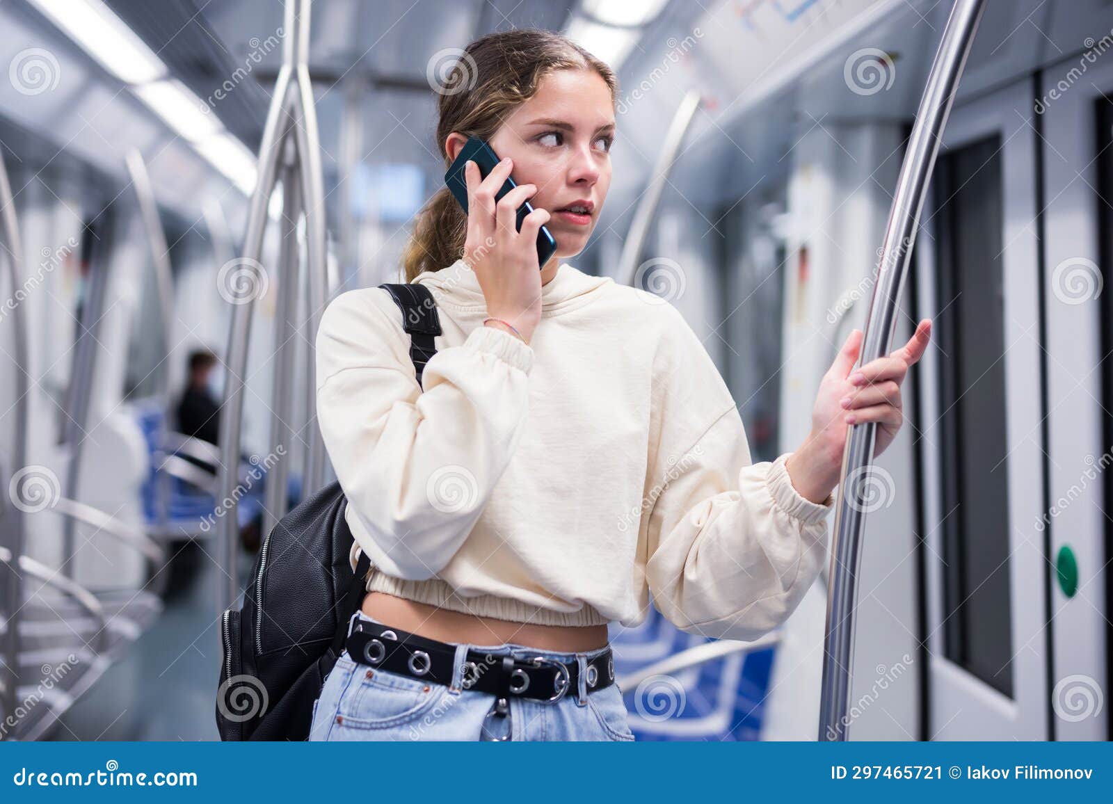 Active Girl Riding on a Subway Train, Talking on a Mobile Phone Stock ...