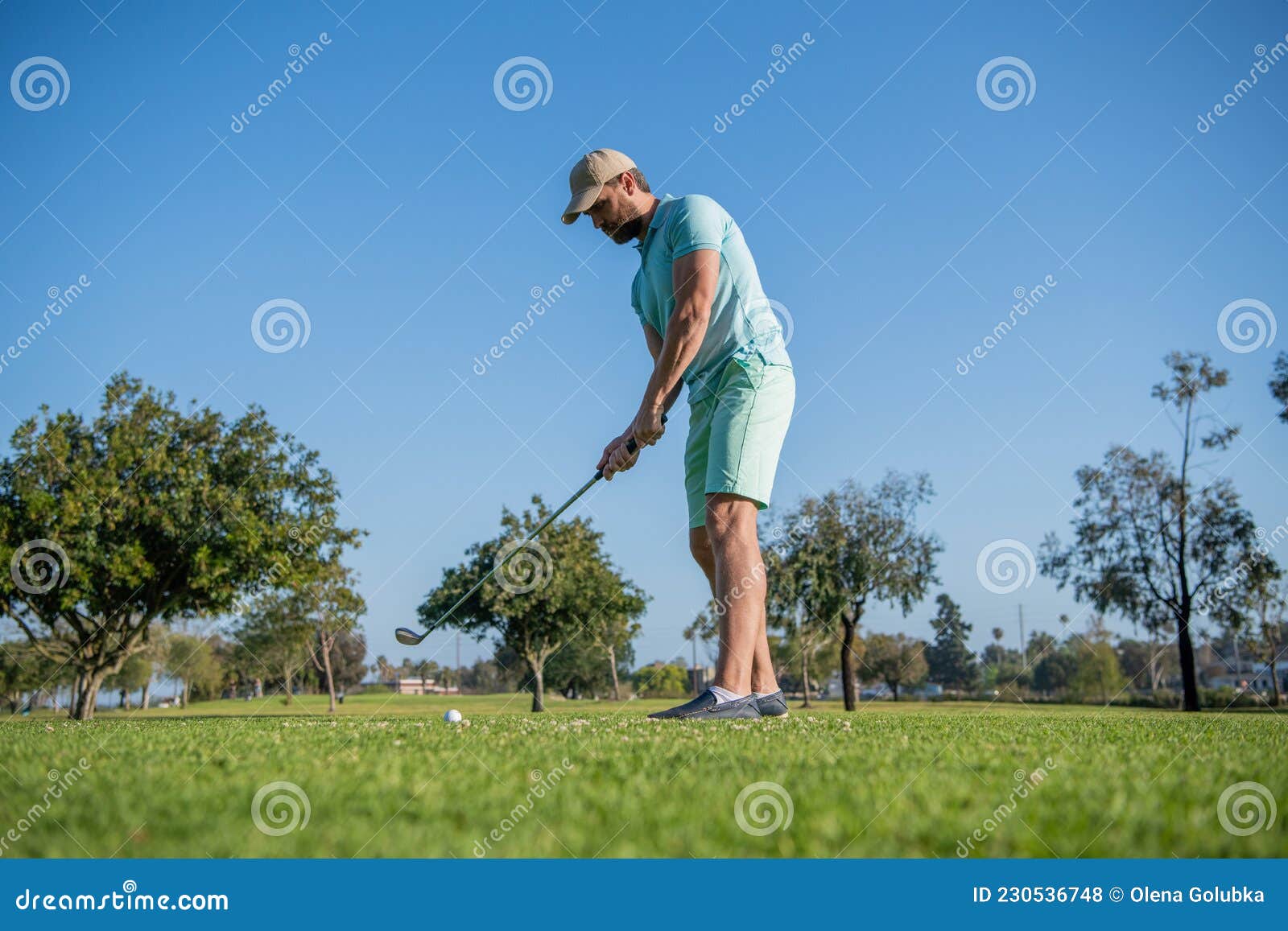 Active Golfer in Cap with Golf Club, Golfing Stock Photo - Image of ...