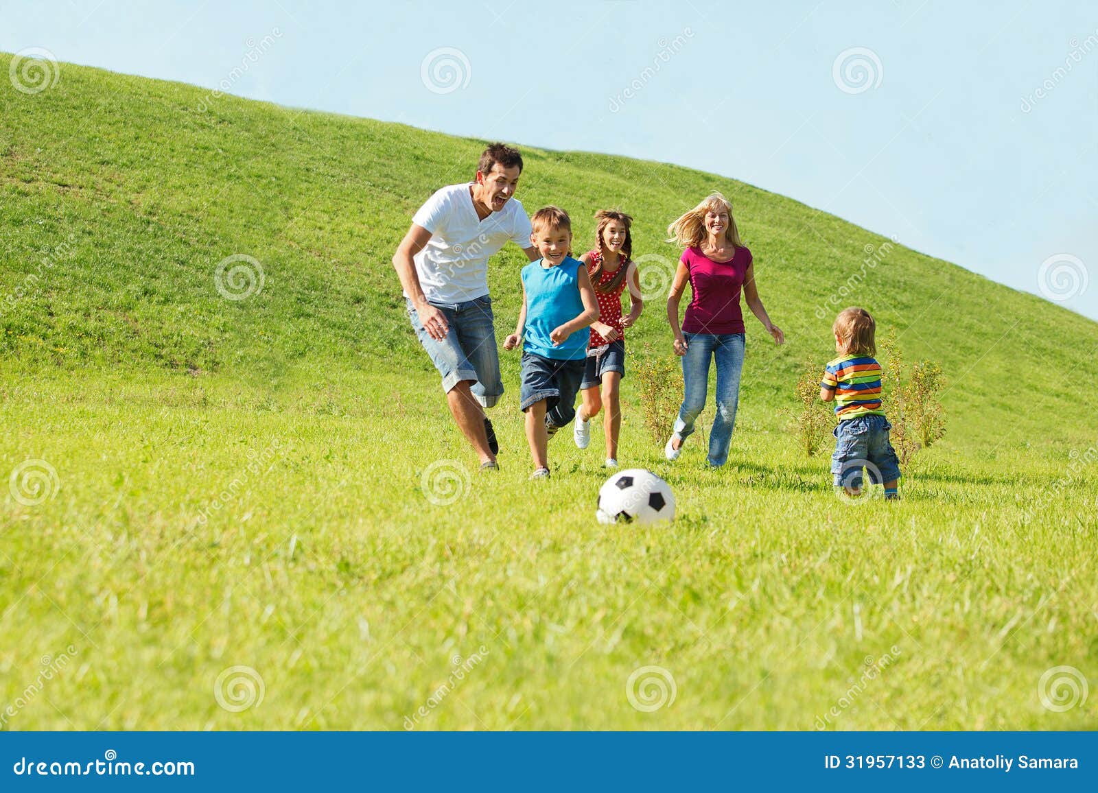 Active happy family stock image. Image of lawn, child - 31957133