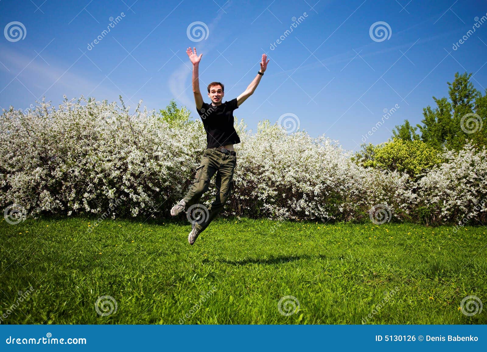 Active jumping man stock photo. Image of grass, active - 5130126