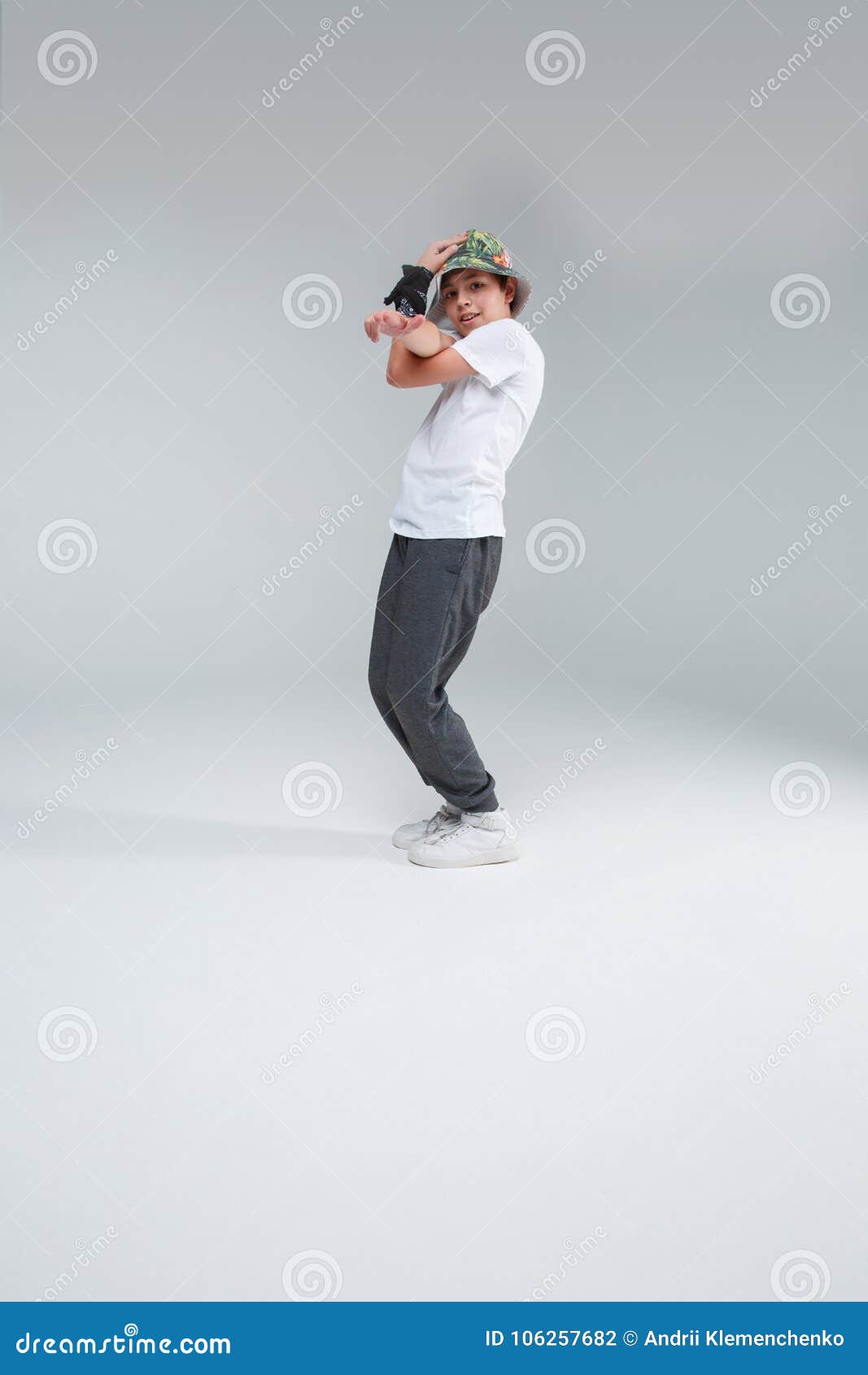Active Little Boy Dancer Breakdance, Doing a Gesture with His Hands ...
