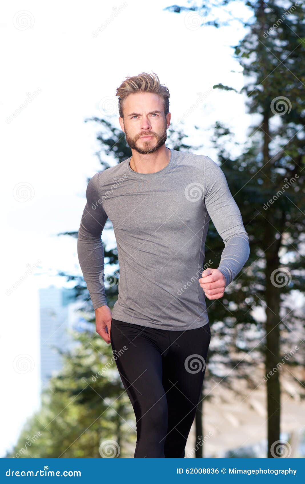 Active man running outside stock photo. Image of cool - 62008836