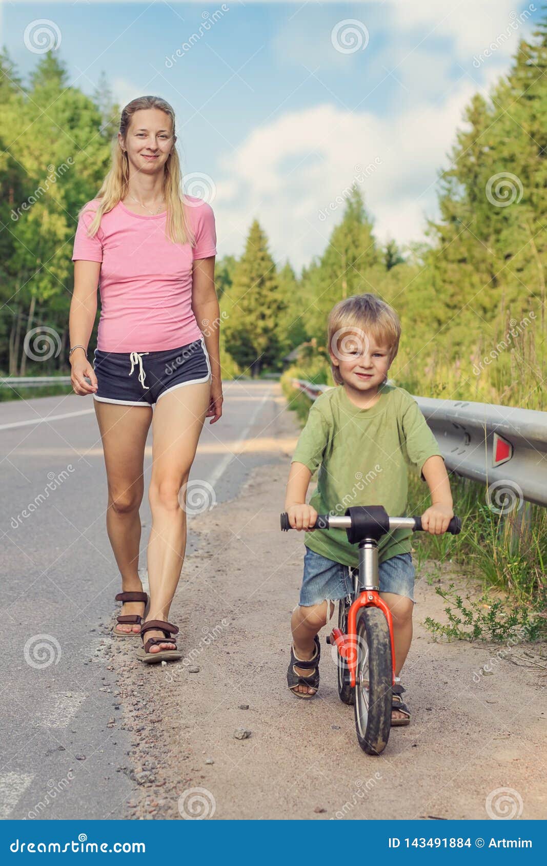 Active Mom Walking with Kid with Bike Stock Photo - Image of parent ...