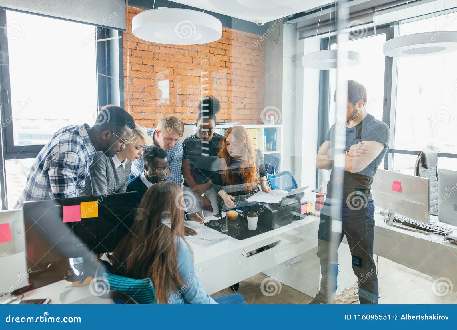 Active Office Workers Have Gathered Around a Table. Do Research Stock ...