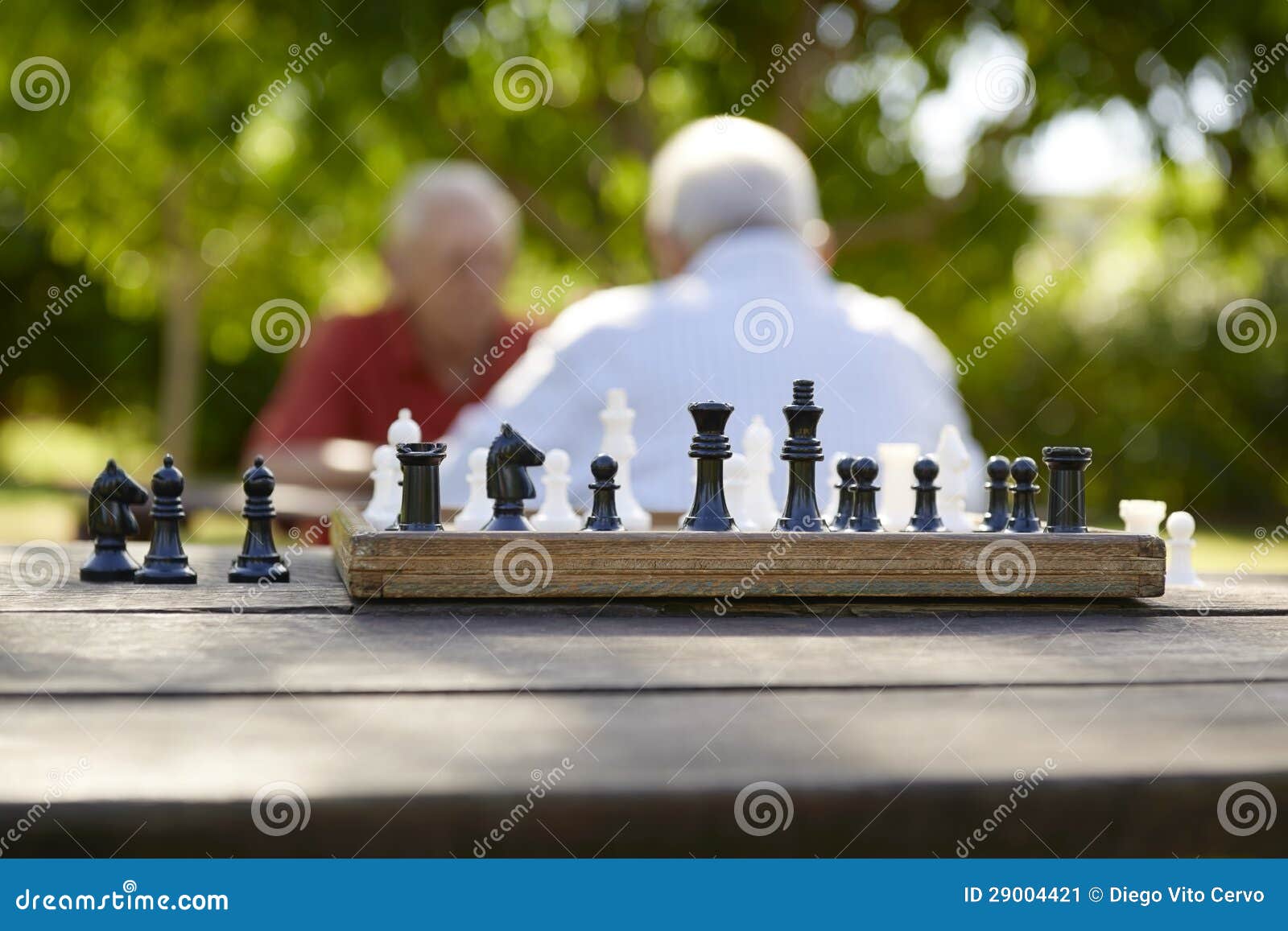 Active Retired People, Two Old Friends Playing Chess at Park Stock ...
