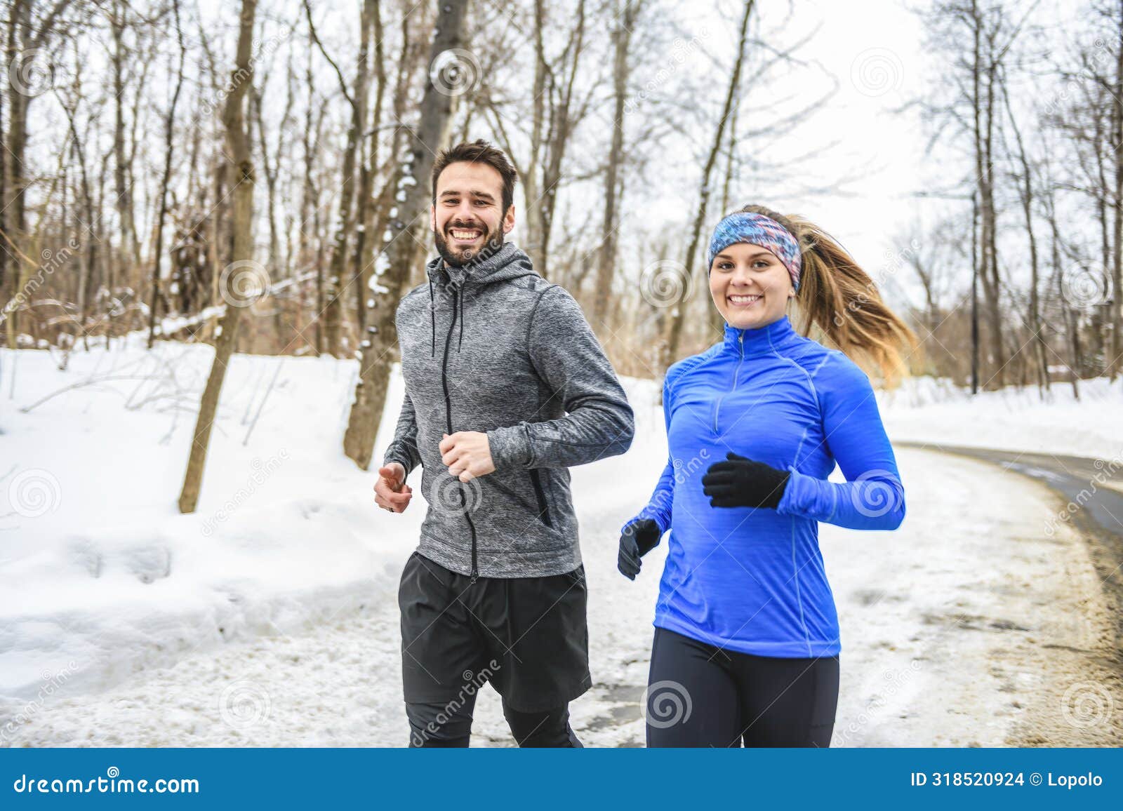 Active Runner Couple Jogging Together in Forest Stock Photo - Image of spring, caucasian: 318520924