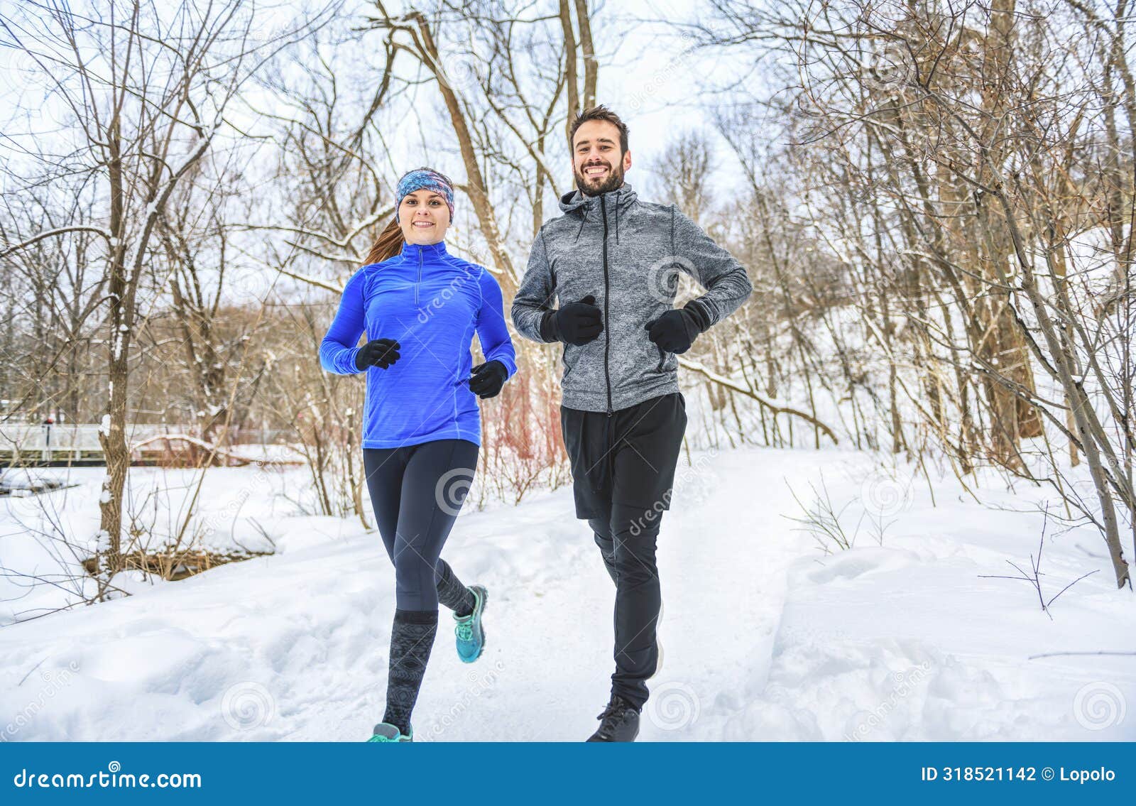 Active Runner Couple Jogging Together in Forest Stock Photo - Image of outside, person: 318521142