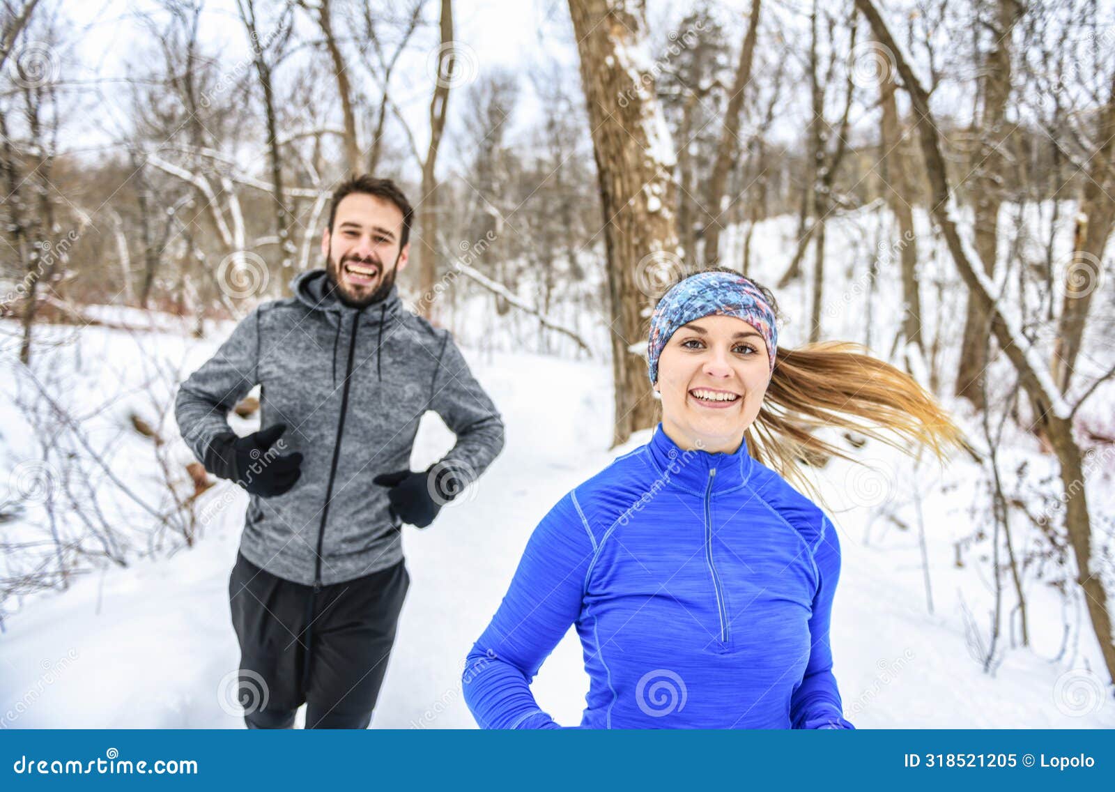 Active Runner Couple Jogging Together in Forest Stock Image - Image of winter, jogger: 318521205