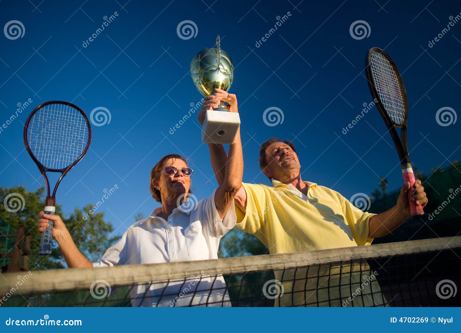 Active senior couple win stock image. Image of casual - 4702269
