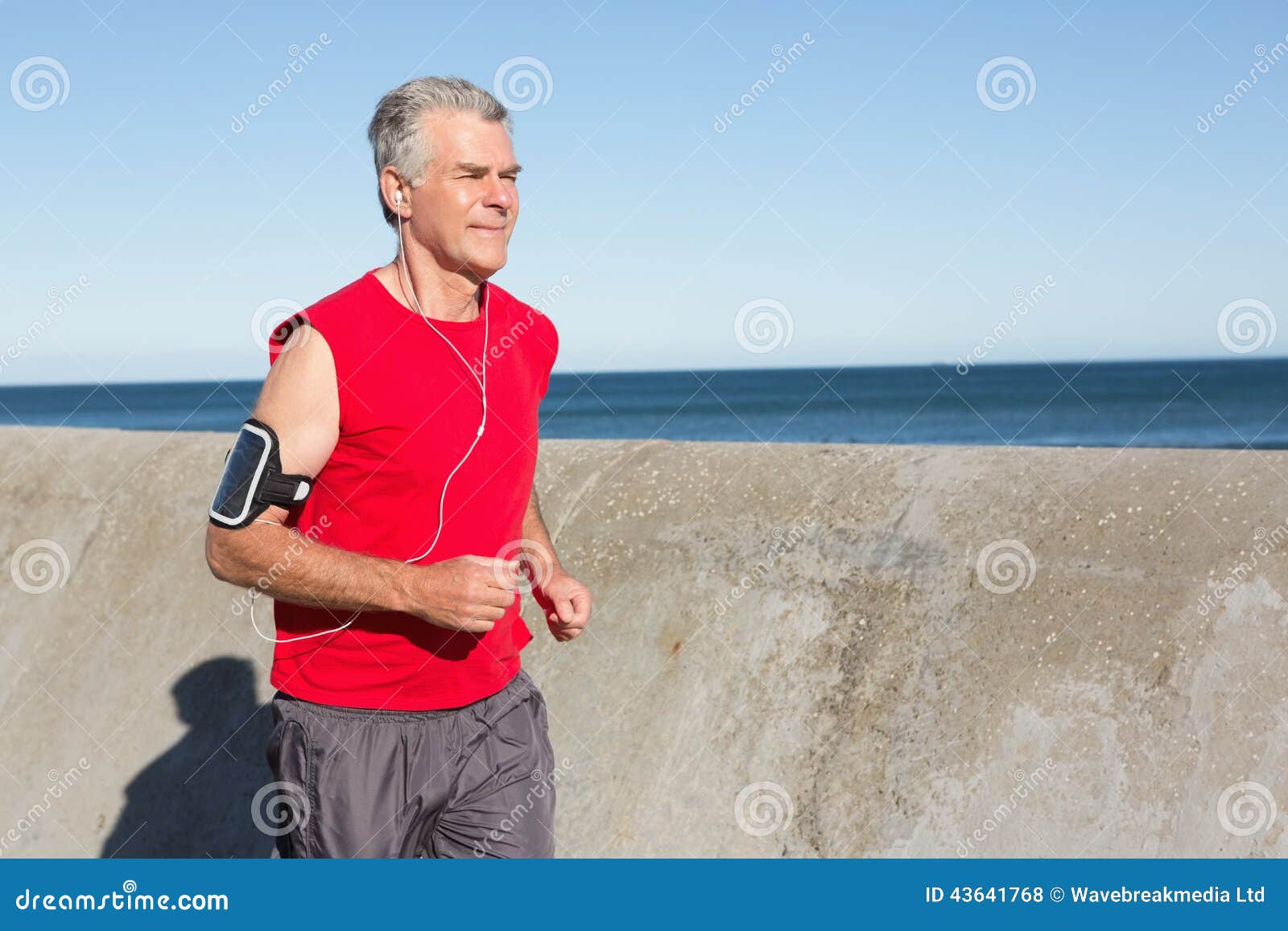 Active Senior Man Jogging on the Pier Stock Photo - Image of caucasian ...