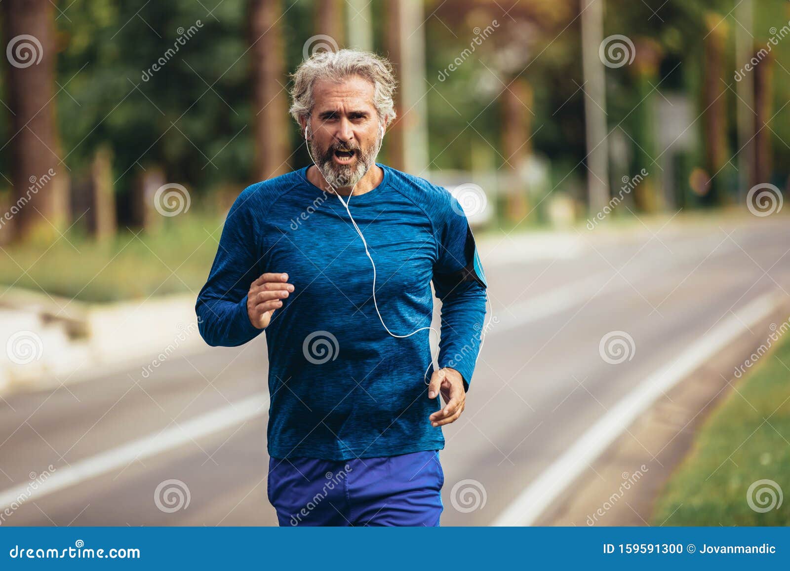 Senior Man Jogging on a Sunny Day Stock Photo - Image of clear ...