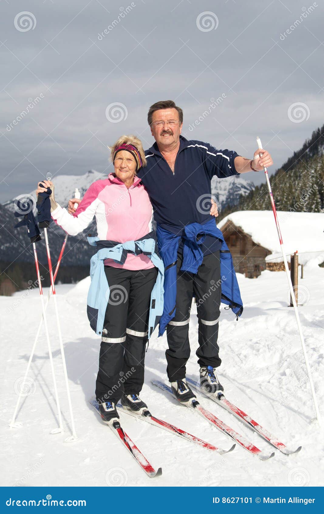 Active seniors in the snow stock image. Image of cold - 8627101