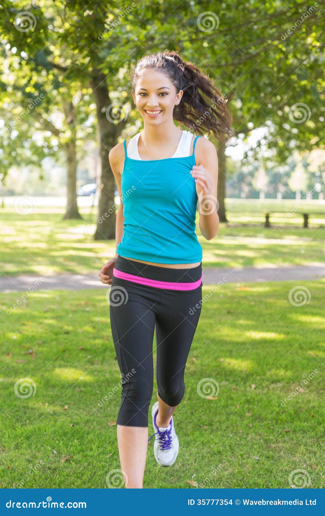 Active Smiling Brunette Jogging Stock Photo - Image of hair, mixedrace ...