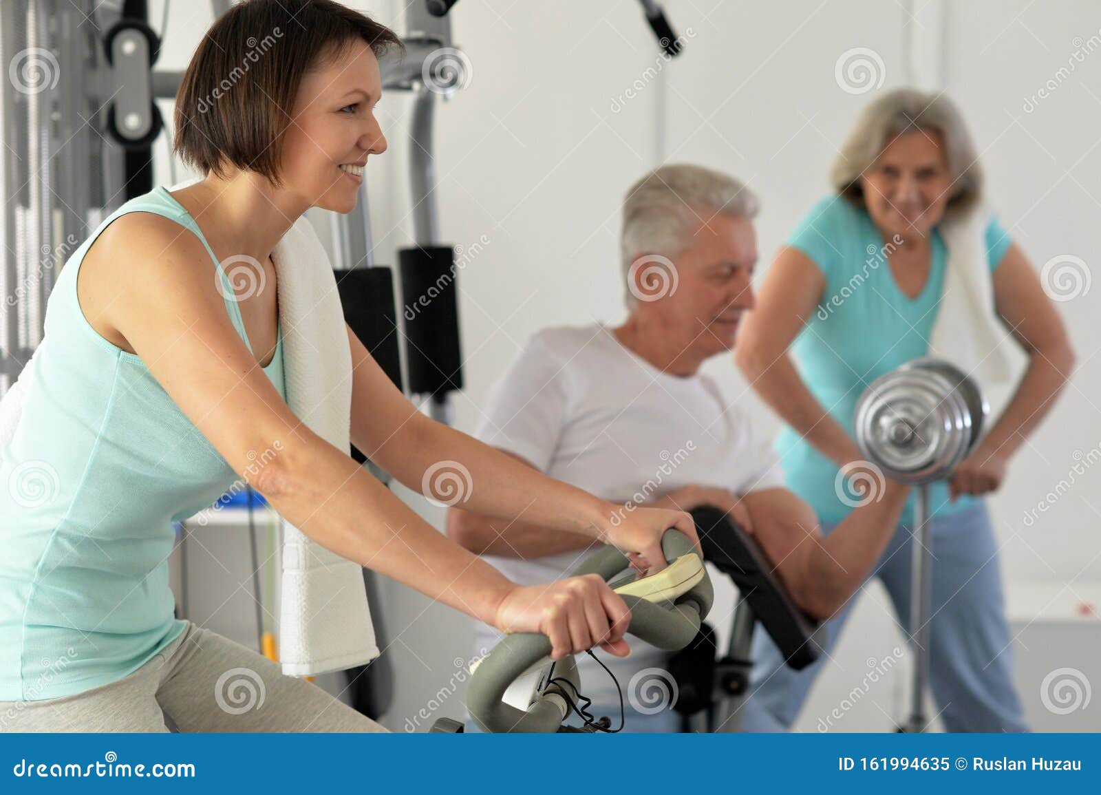 Portrait of Active Smiling People Exercising in Gym Stock Image - Image ...