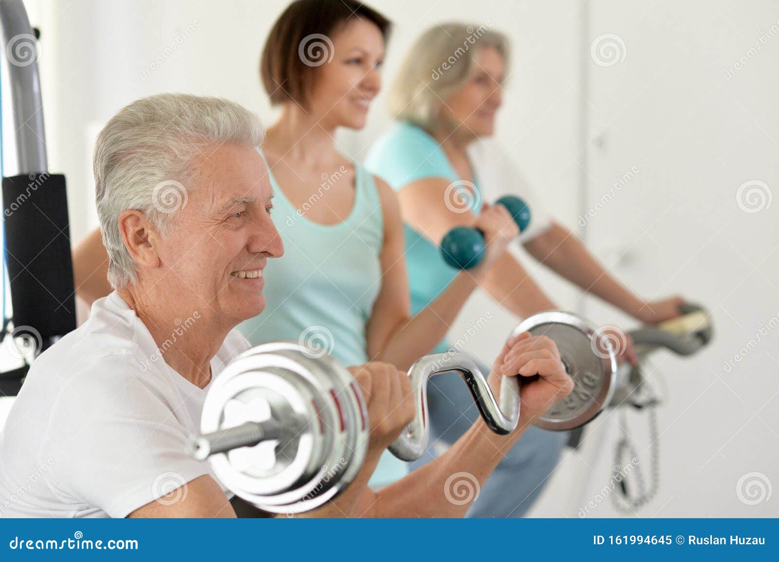 Portrait of Active Smiling People Exercising in Gym Stock Image - Image ...