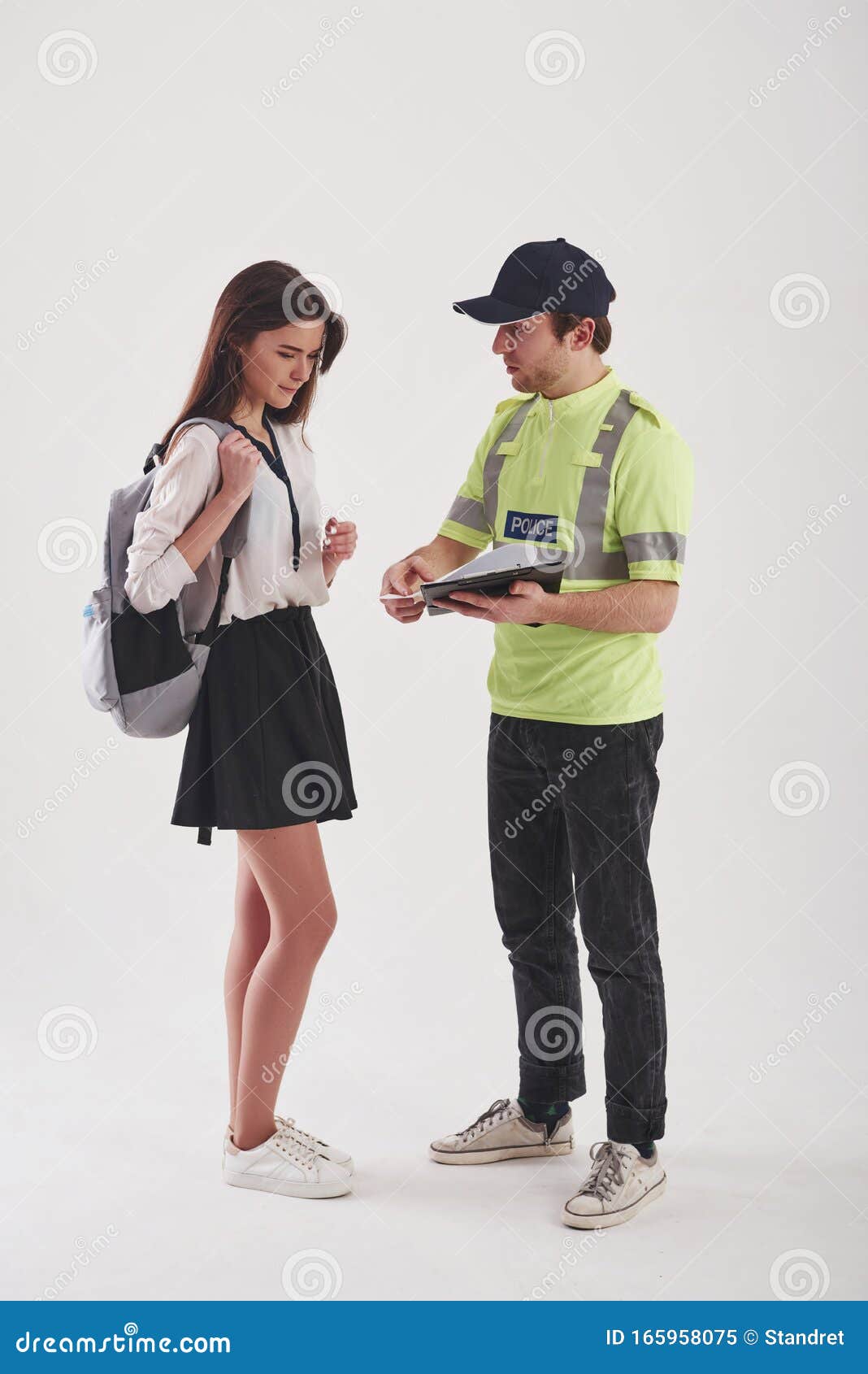 Active Talking. Policeman in Green Uniform Have Conversation with Young ...