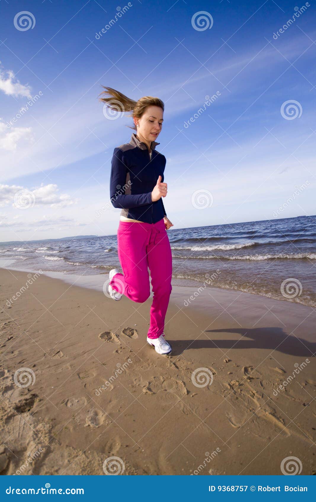 Active woman on the beach stock image. Image of lifestyle - 9368757