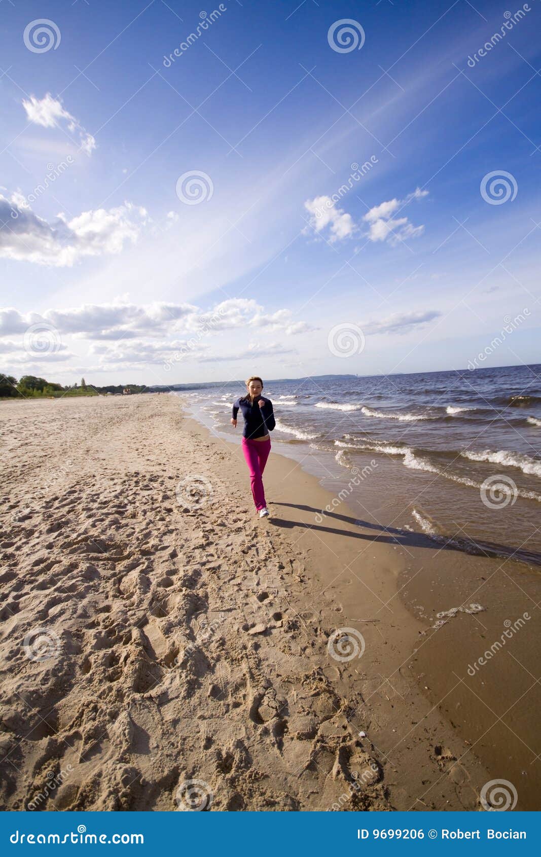 Active woman on the beach stock photo. Image of active - 9699206