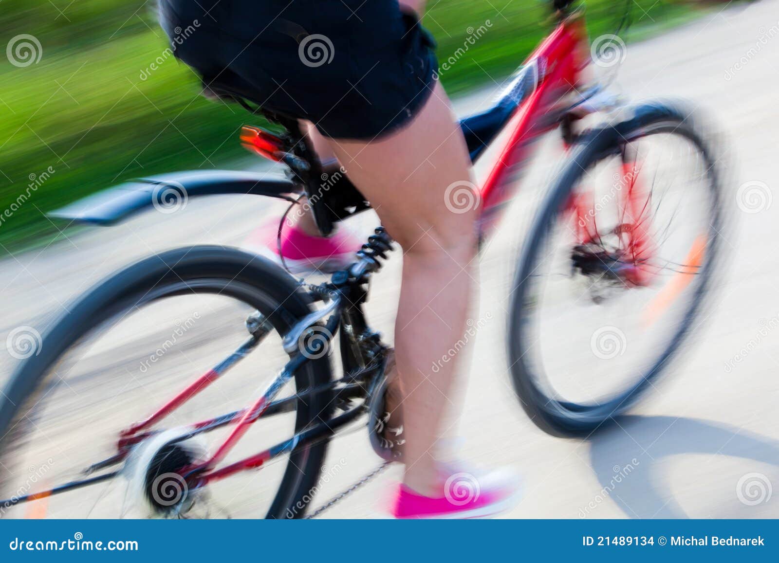 Active woman on a bike stock photo. Image of fitness - 21489134