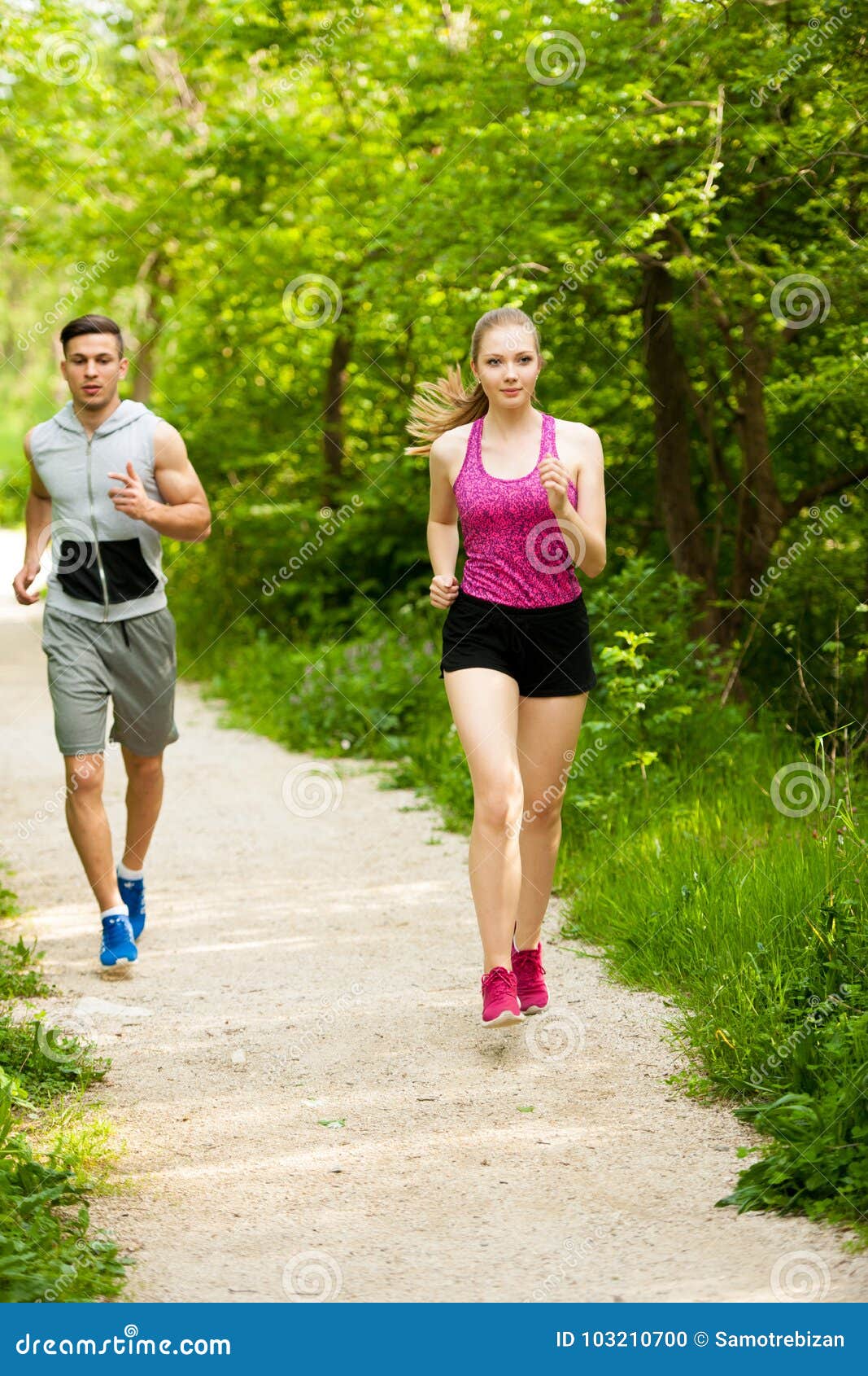 Active Young Couple Running in the Park Stock Photo - Image of active ...