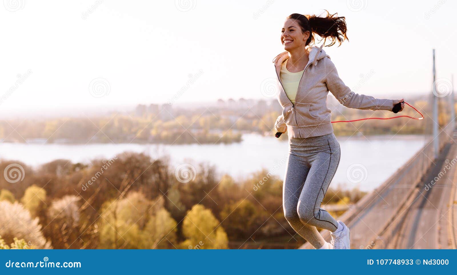 Active Woman Jumping with Skipping Rope Outdoors Stock Image - Image of ...