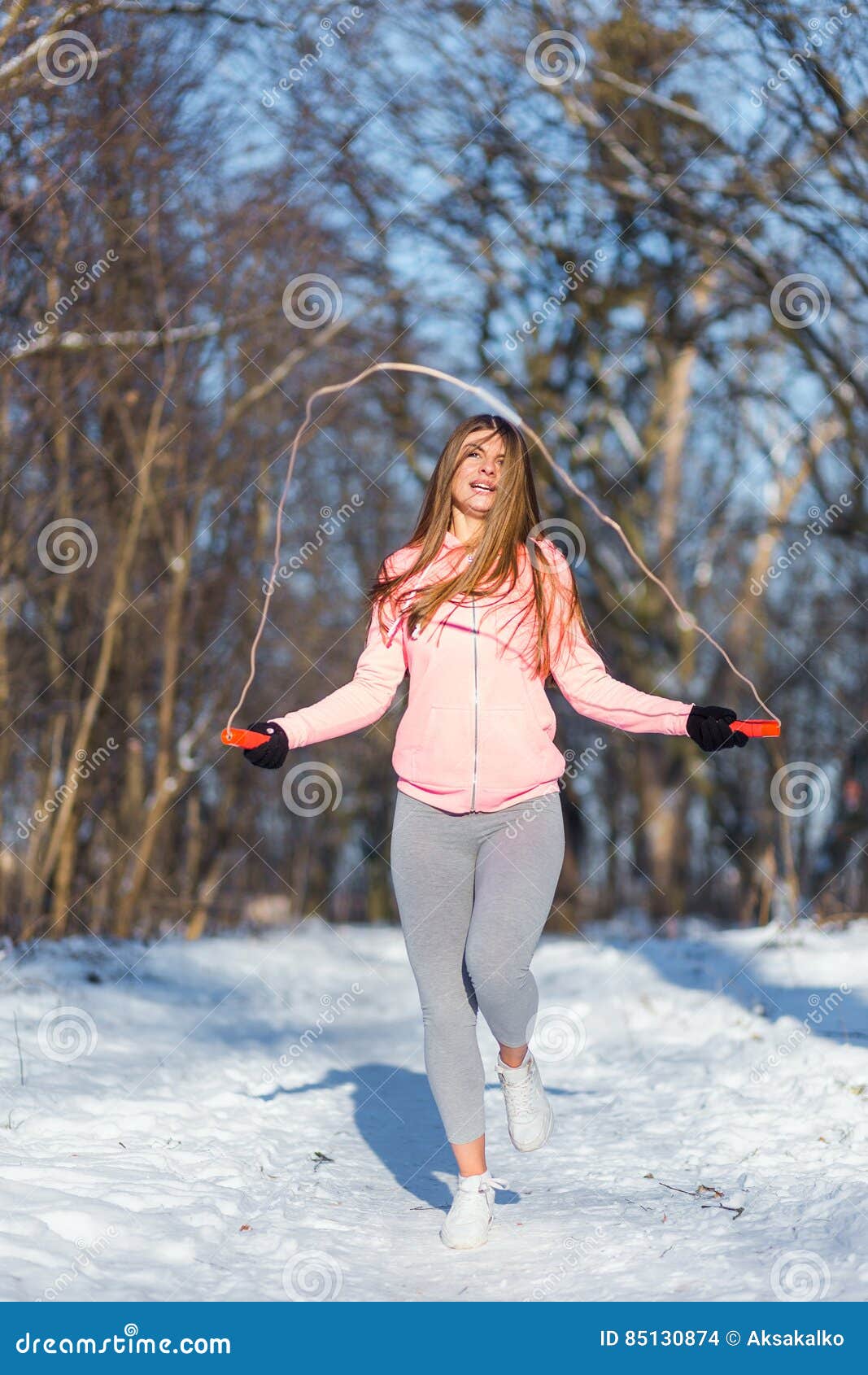Active Young Woman Performs an Exercise with a Skipping Rope Stock ...