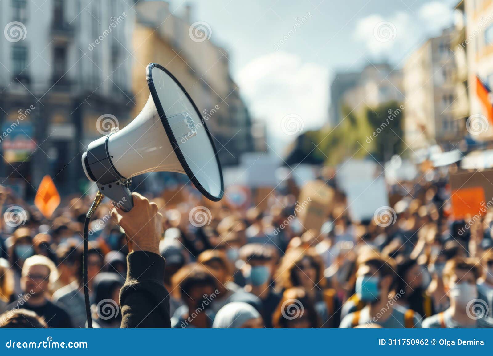 Activist Holding Megaphone at Protest, Crowd of Demonstrators in Urban ...
