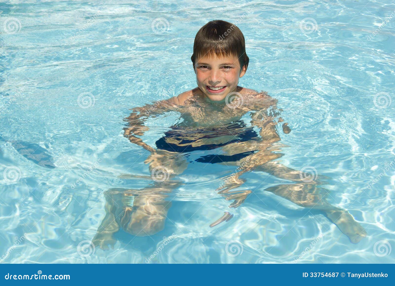 Activities on the Pool. Boy Swimming and Playing in Water I Stock Image ...