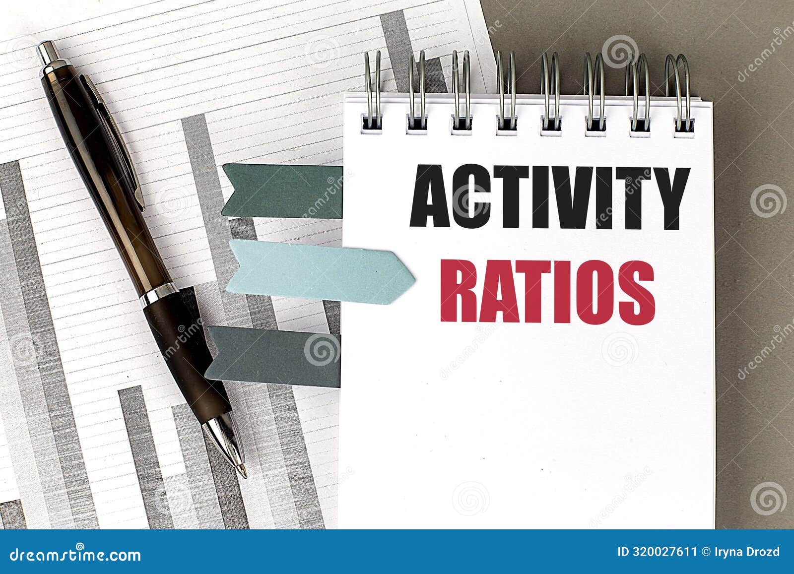 ACTIVITY RATIOS Text on Notebook with Chart on Gray Background Stock ...