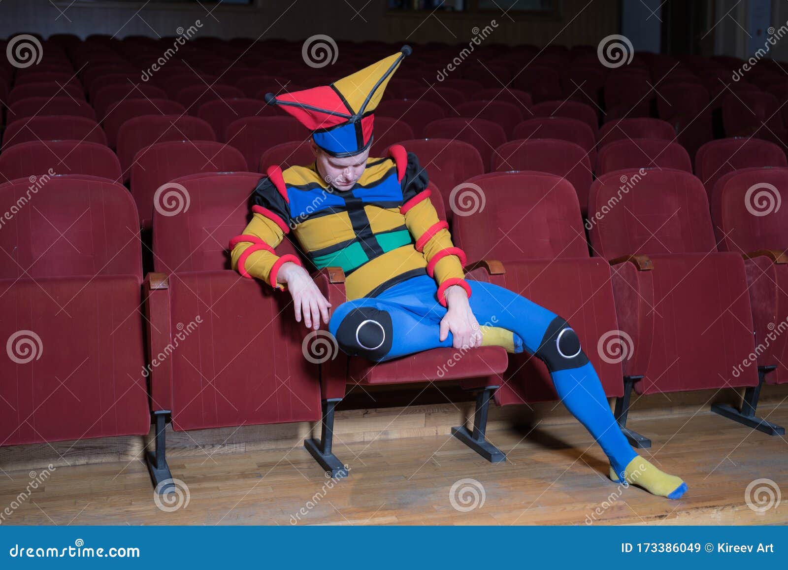 Actor Dressed Jester`s Costume in Interior of Old Theater. Stock Image ...