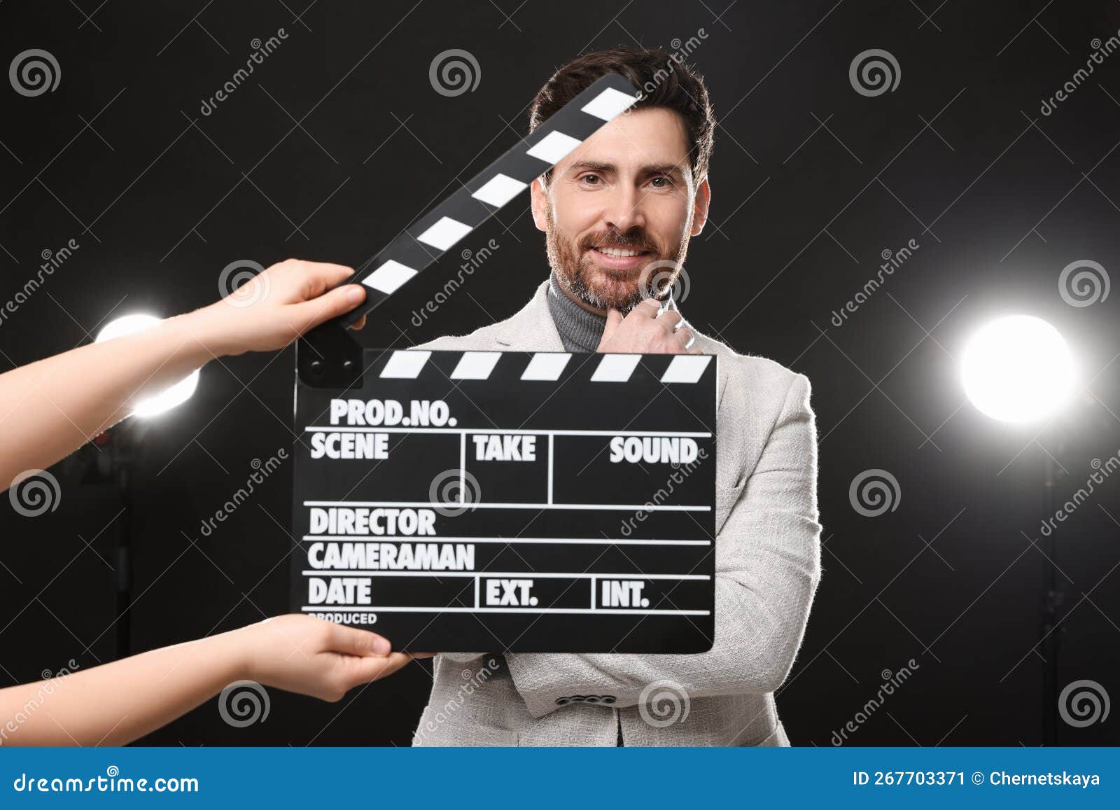 Actor Performing while Second Assistant Camera Holding Clapperboard on ...