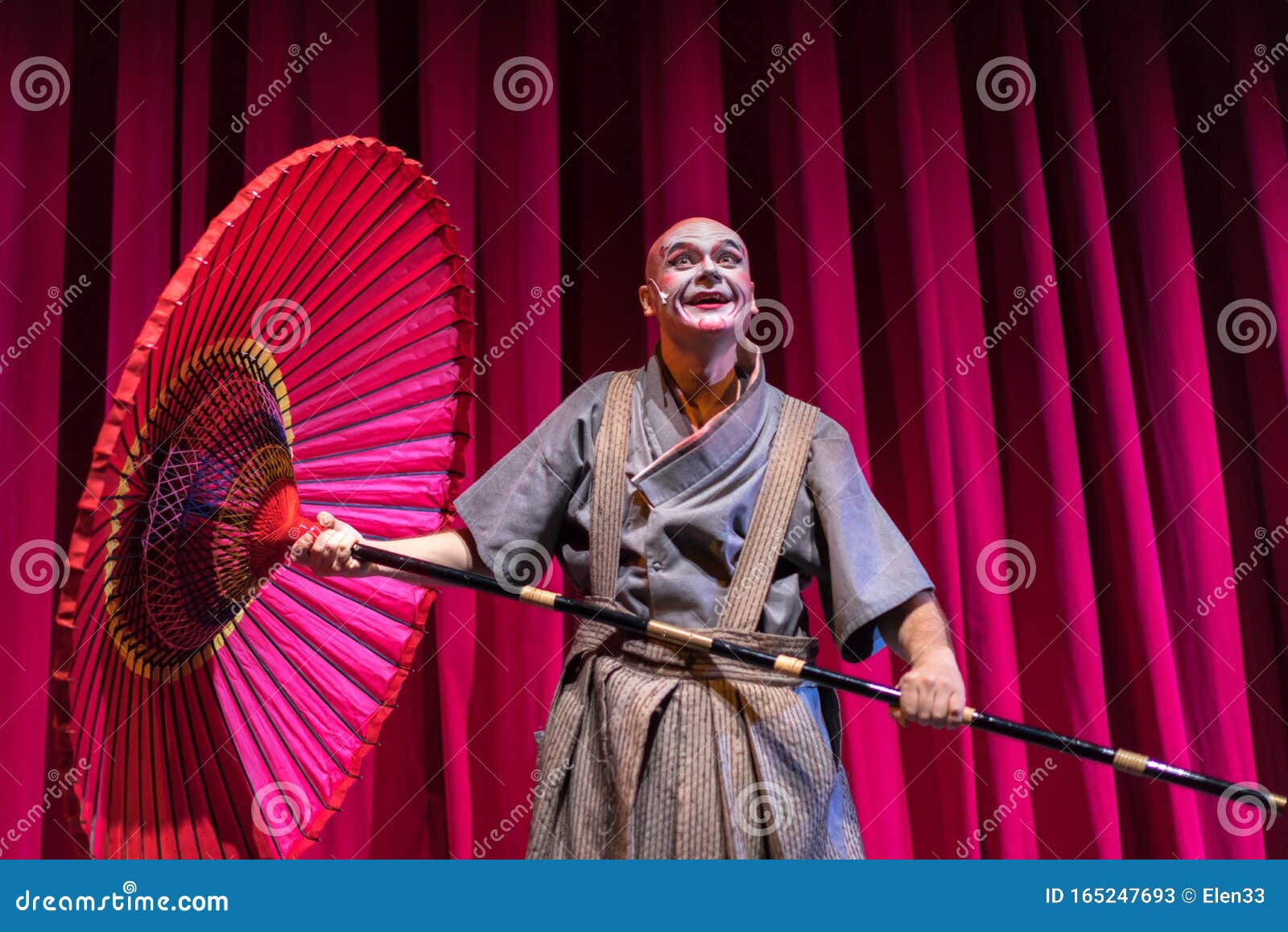 Actor with Umbrella on the Stage during the Samurai Sword Performance ...