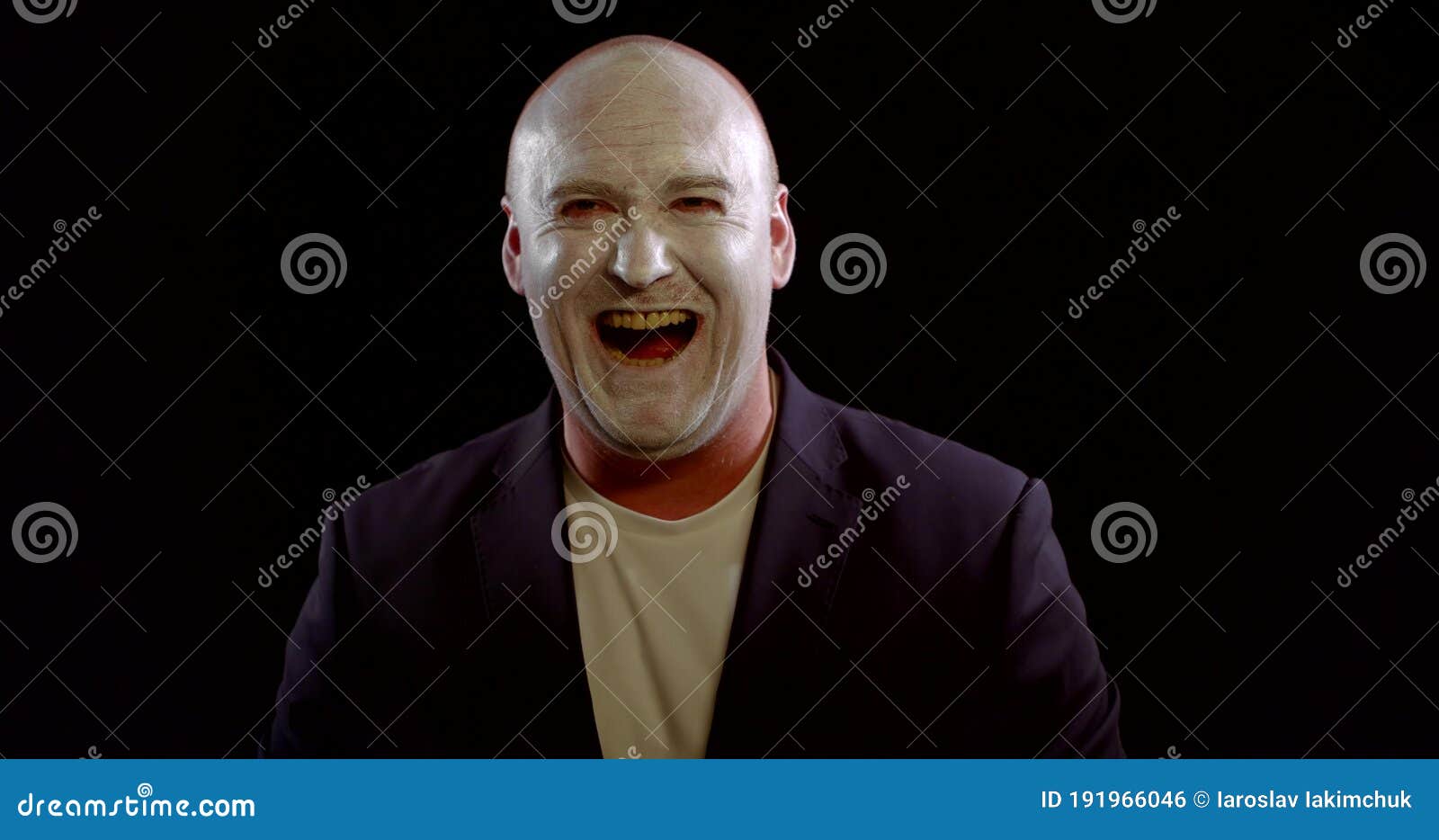 Actor with White Painted Face Poses for Camera and Laughs Stock Photo ...