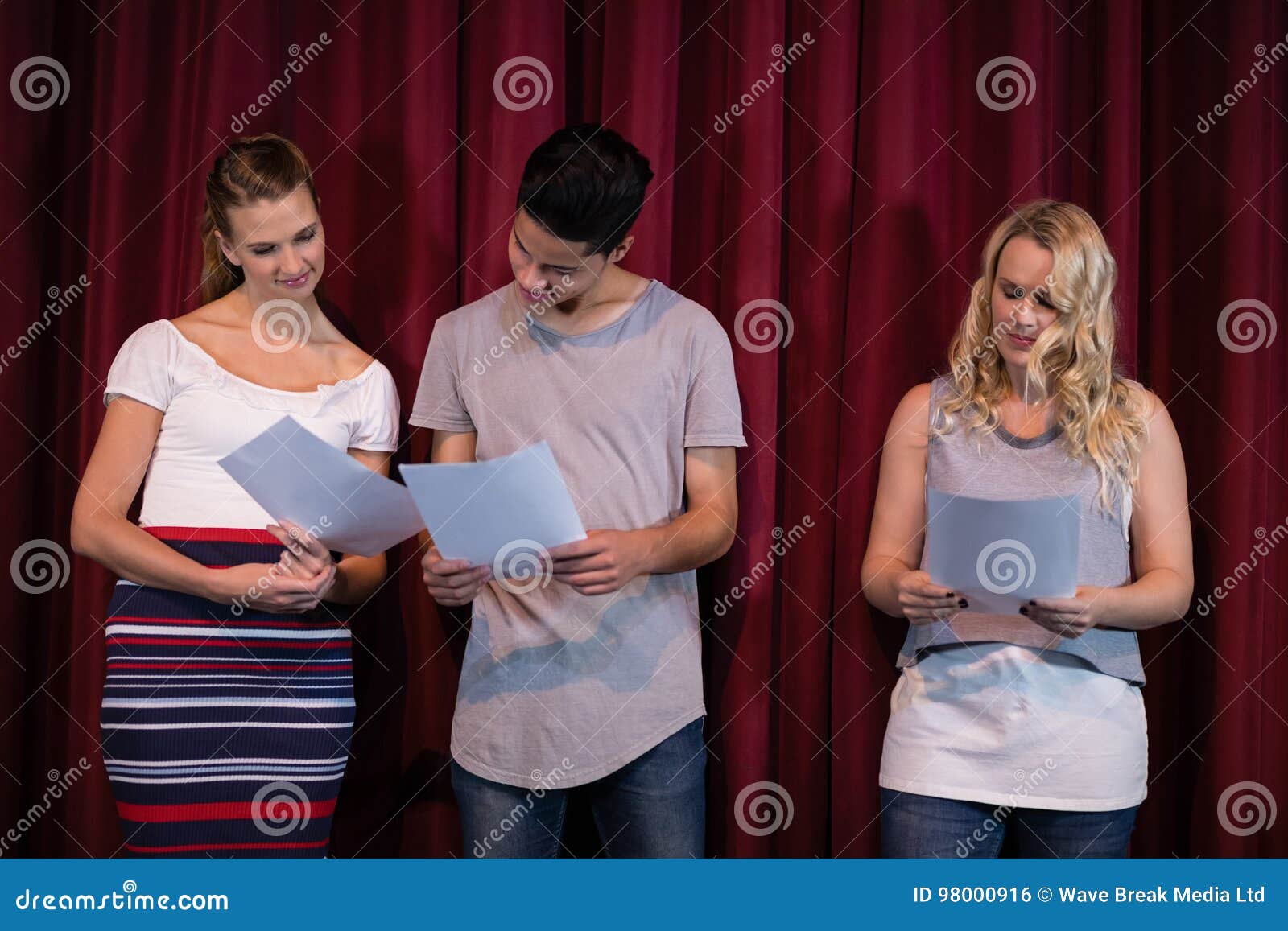 Actors Reading Their Scripts on Stage Stock Photo - Image of paper ...