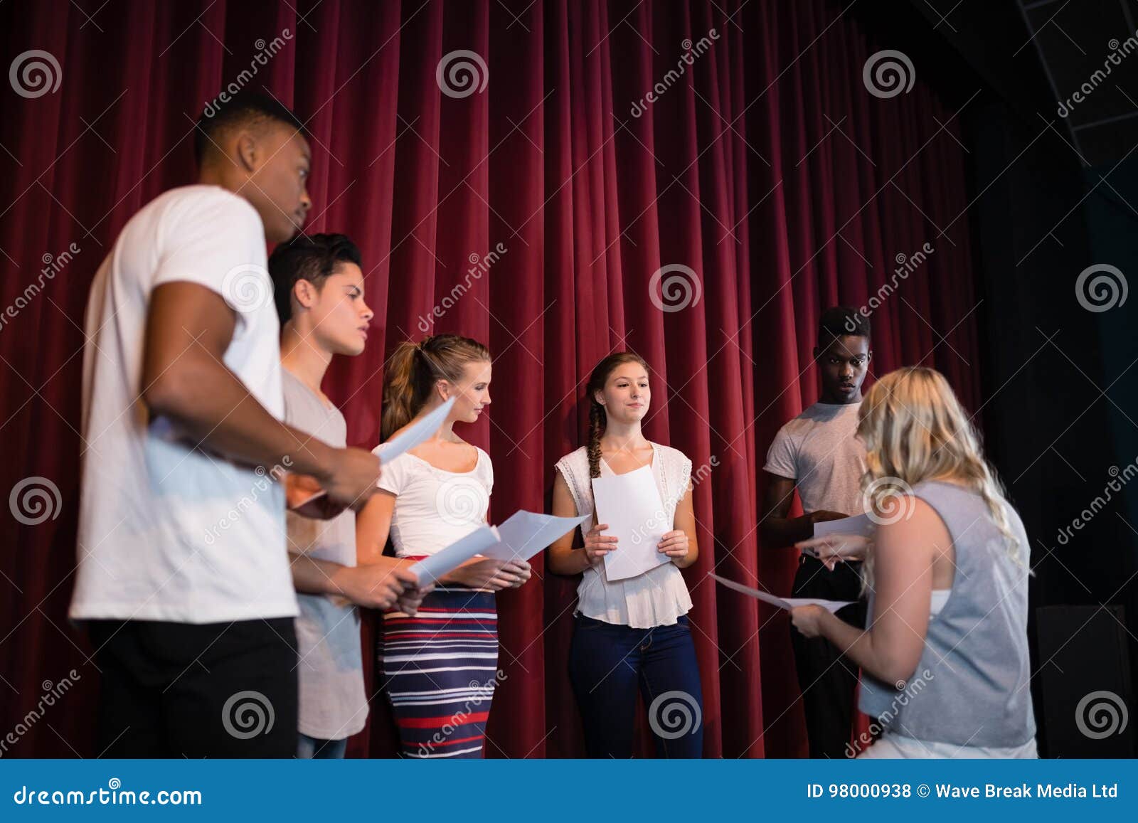 Actors Reading Their Scripts on Stage Stock Photo - Image of group ...